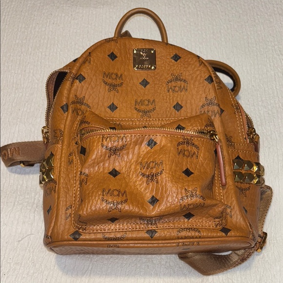 MCM | Bags | Mcm Cognac Backpack With Logo Pattern | Poshmark